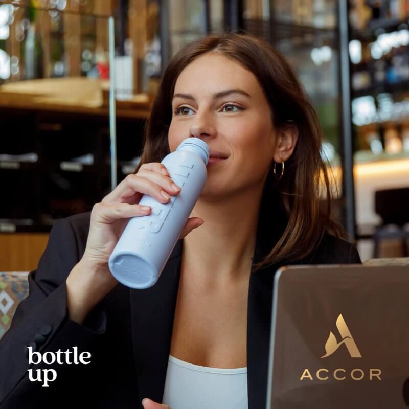 bottle up: still water in a reusable, plant-based bottle